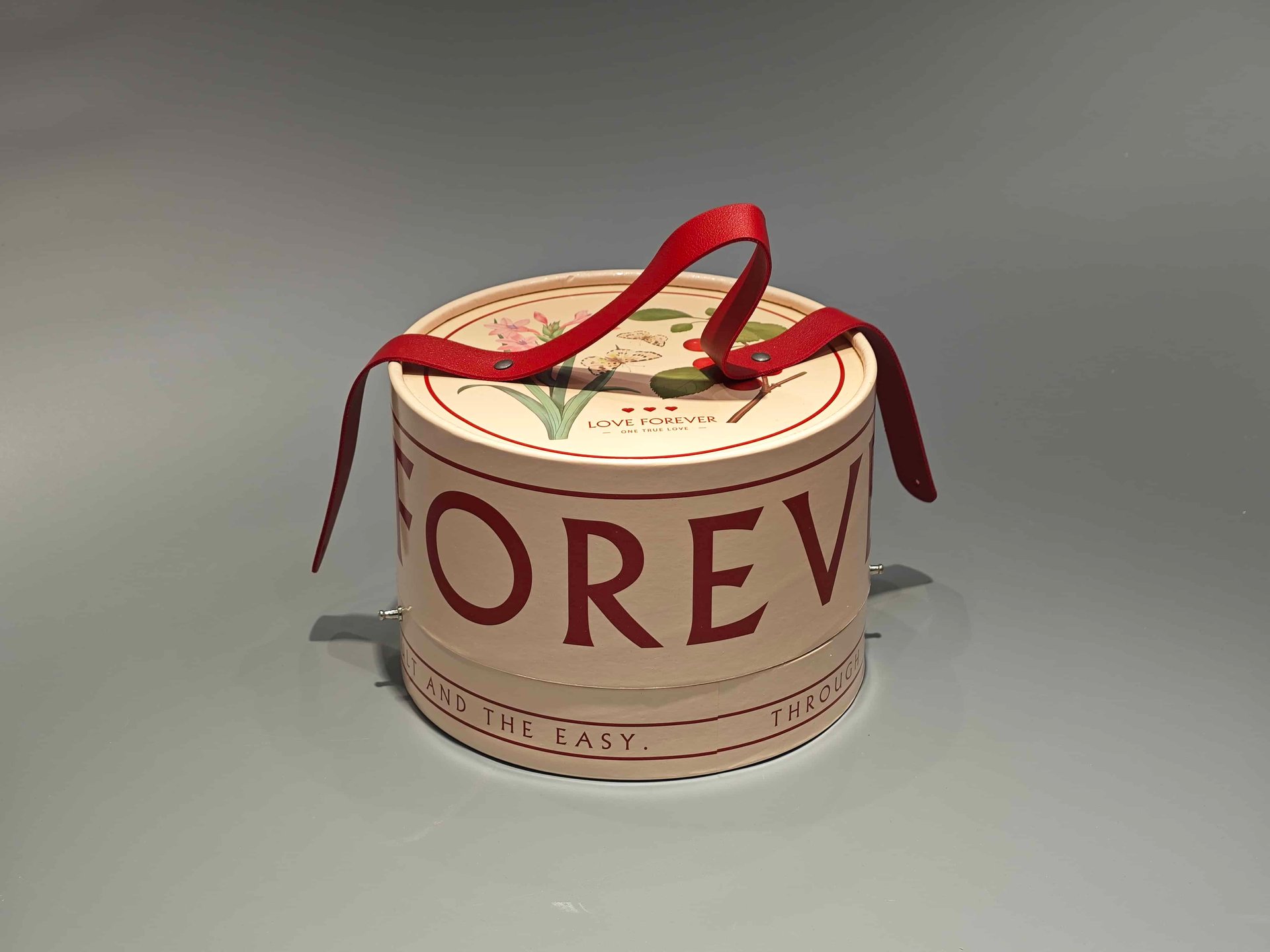 Round shaped lift-off lid box with strap – Witpax